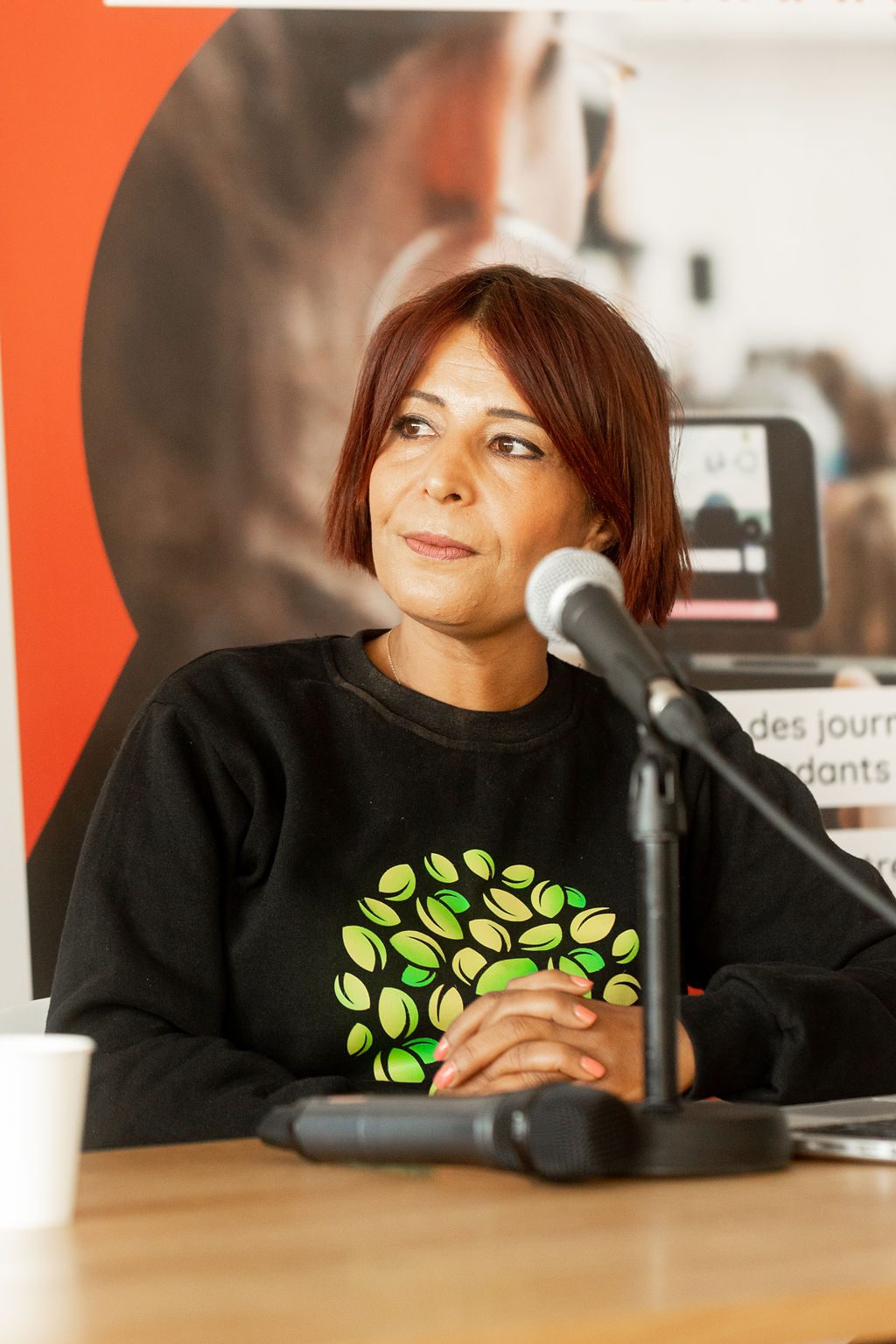 Mabrouka Khedir, a Tunisian journalist with green-coloured glasses ...